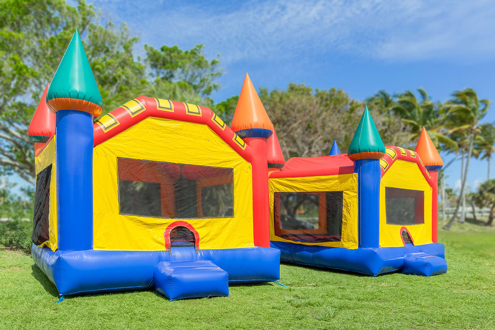 USA Multi Color Castle Moonwalk Rentals | Sky High Party Rentals