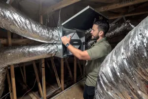 Adding "lungs" to an air-tight commercial building.